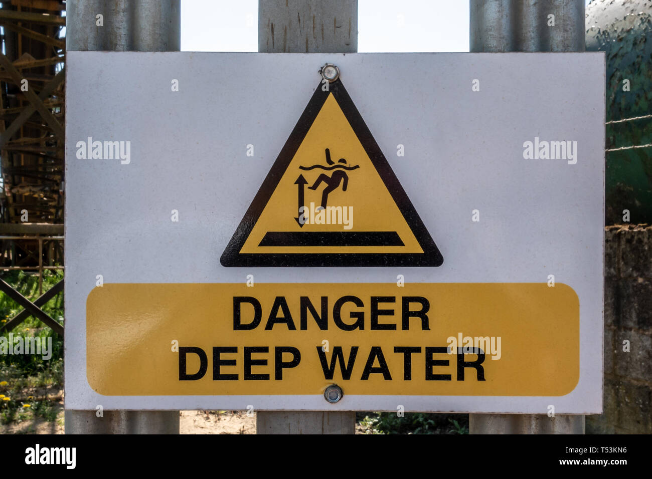 Danger Deep Water warning sign on a quarry gate Stock Photo - Alamy