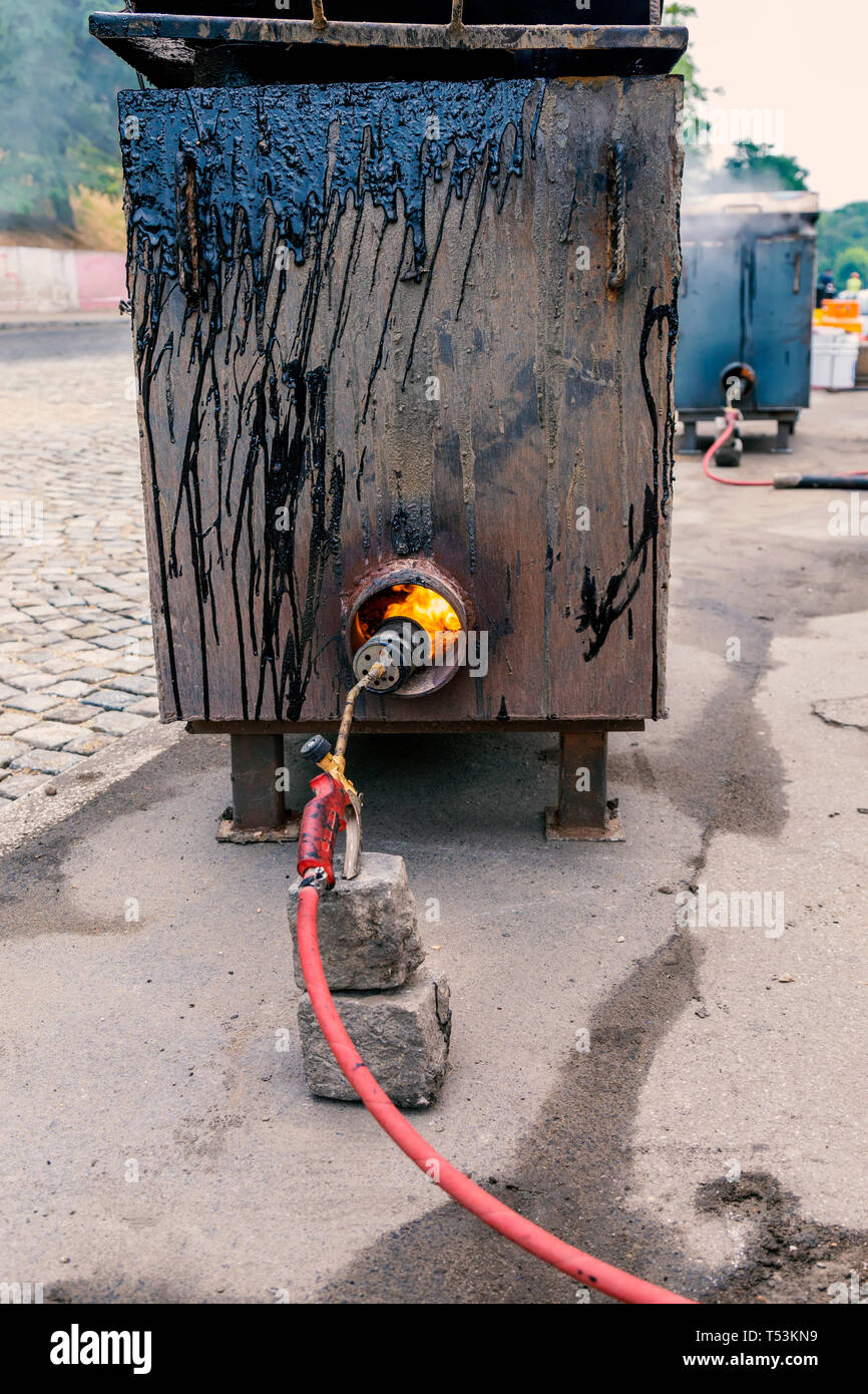 Boilers for melting tar, set up for pitch jointing with molten bitumen ...