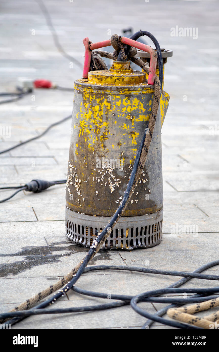 Submersible water pump. Abstract: Sewer Lines Cleaning Service, Unblock ...