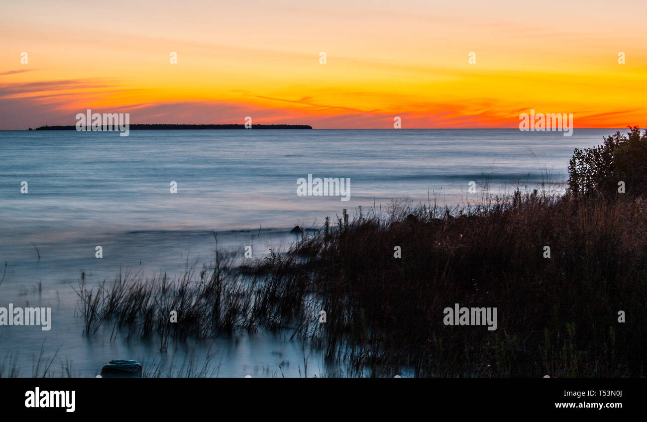 Sunset Over lake Michigan and Green Island, Michigan Stock Photo - Alamy