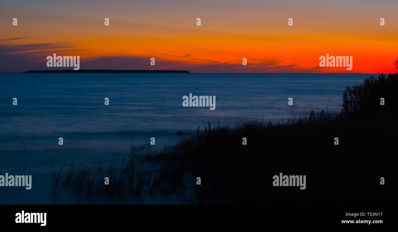 Sunset Over lake Michigan and Green Island, Michigan Stock Photo - Alamy