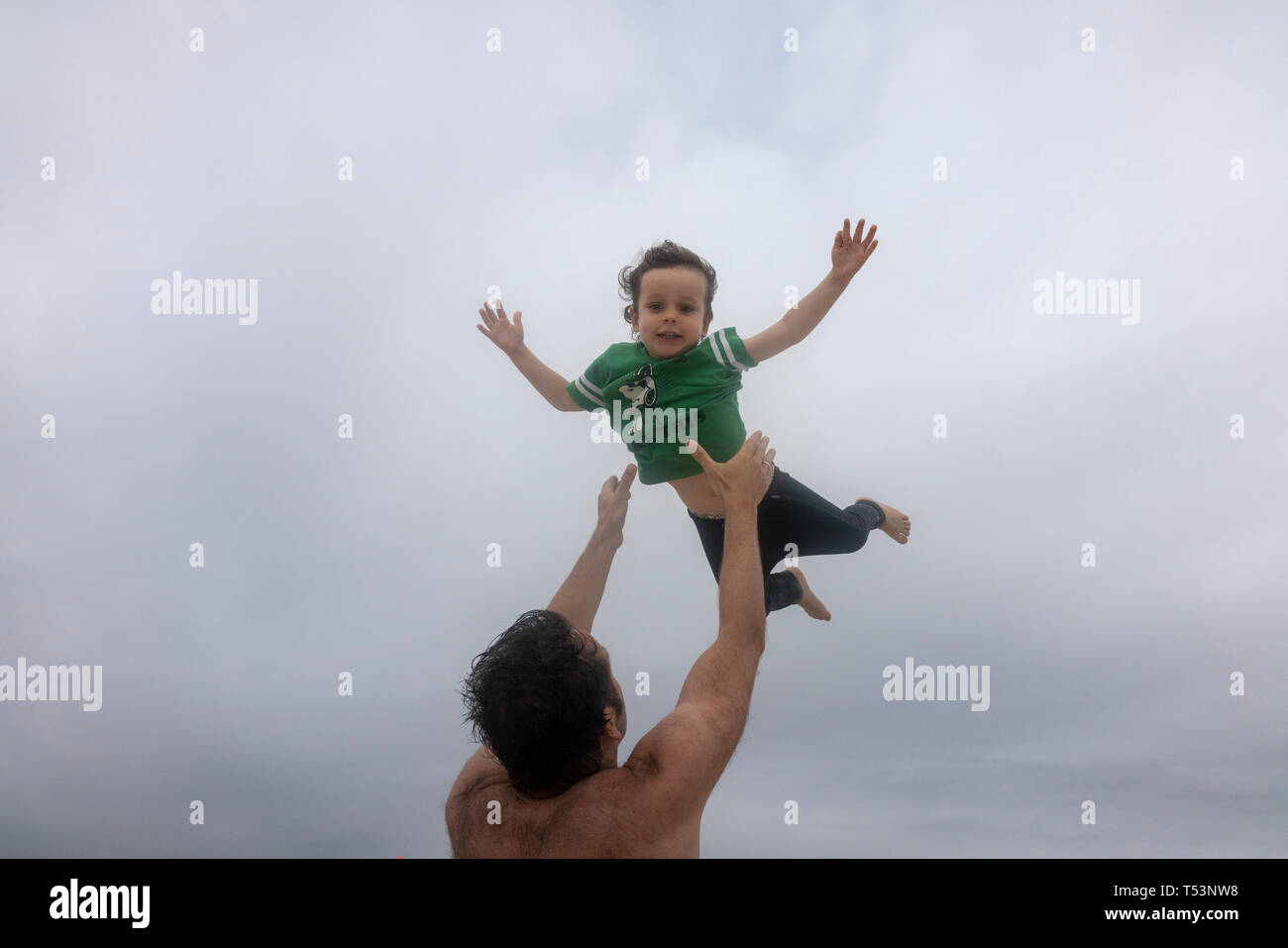 boy with dad flying Stock Photo - Alamy boy with dad flying Stock Photo - Alamy