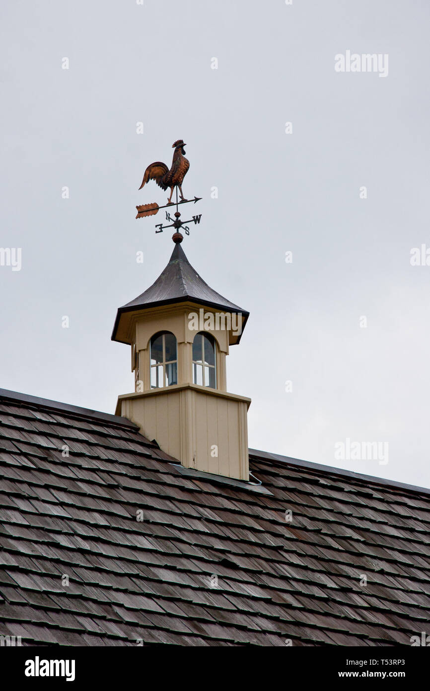 Cupola on top of a barn rook with a copper rooster weather vane Stock ...
