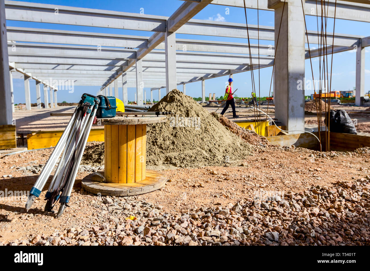 Packed surveyor equipment, instrument in plastic box and tripod is ...