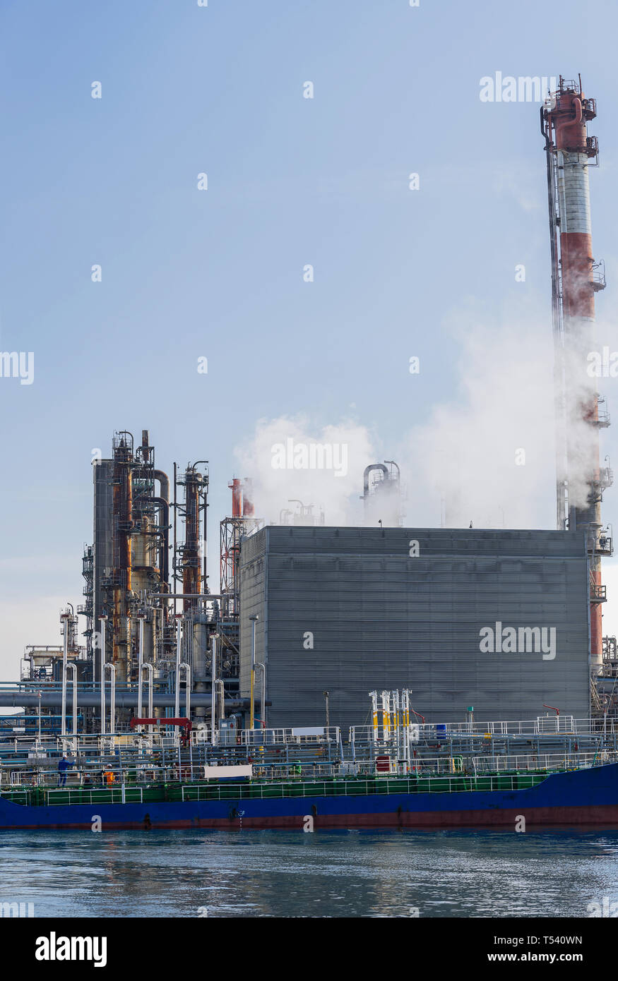 Tanker boat loading fuel from oil Chemical Factory in Kawasaki Japan ...