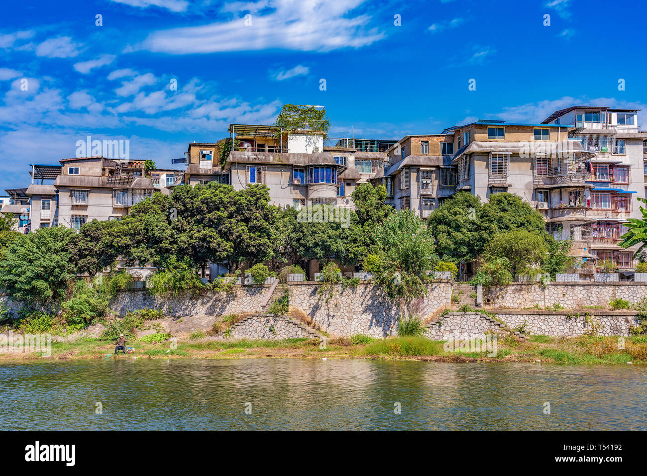 GUILIN, CHINA - NOVEMBER 01: Riverside houses and apartment buildings ...