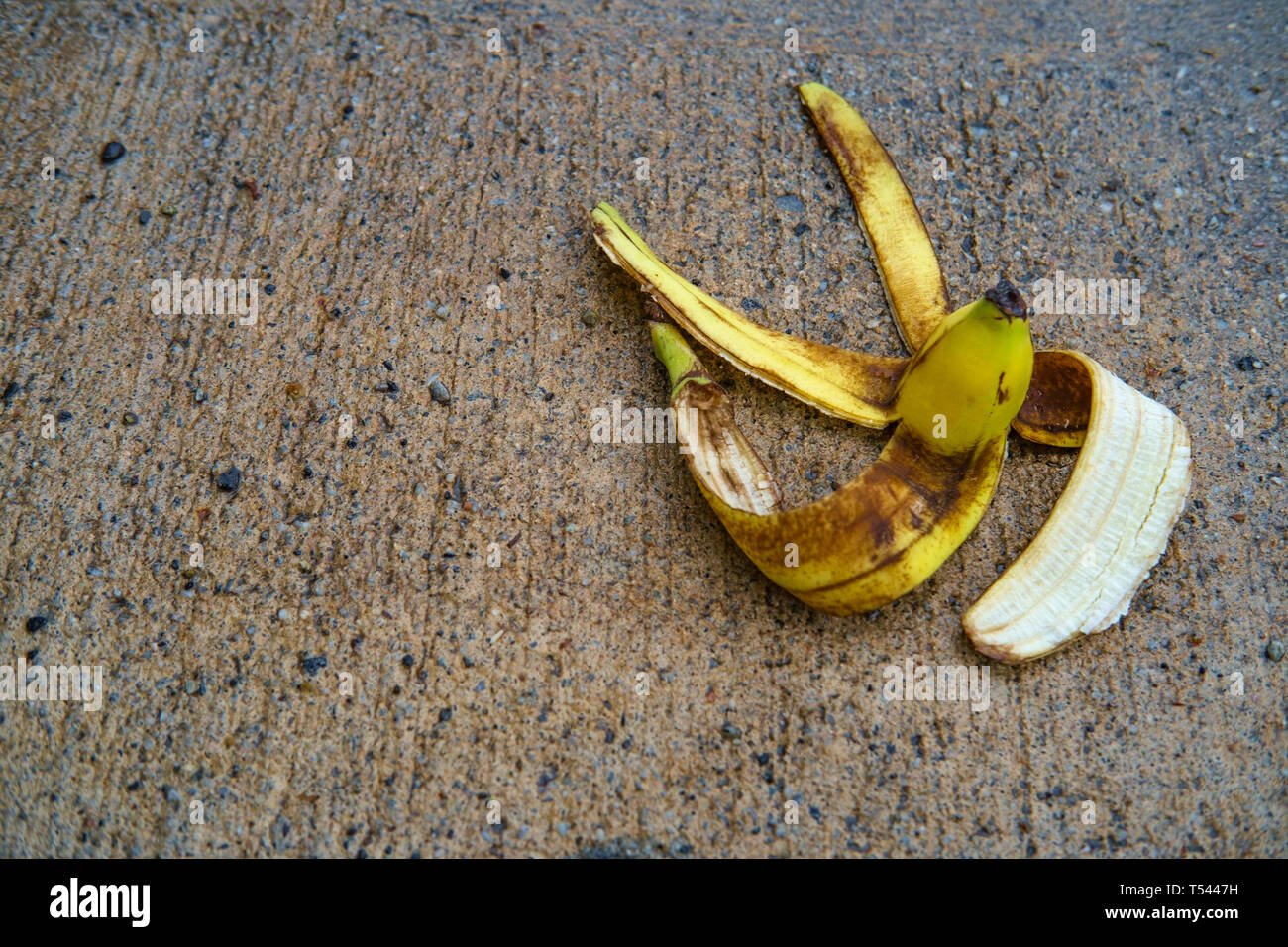 Slapstick slippery comedy banana peel laying on ground ready to make ...