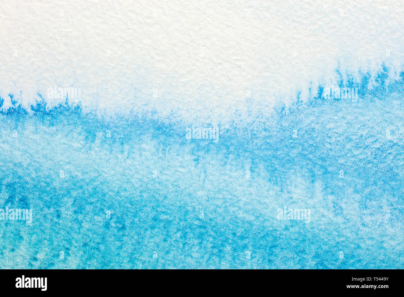 abstract blue watercolor wash background. hand drawn on textured paper ...