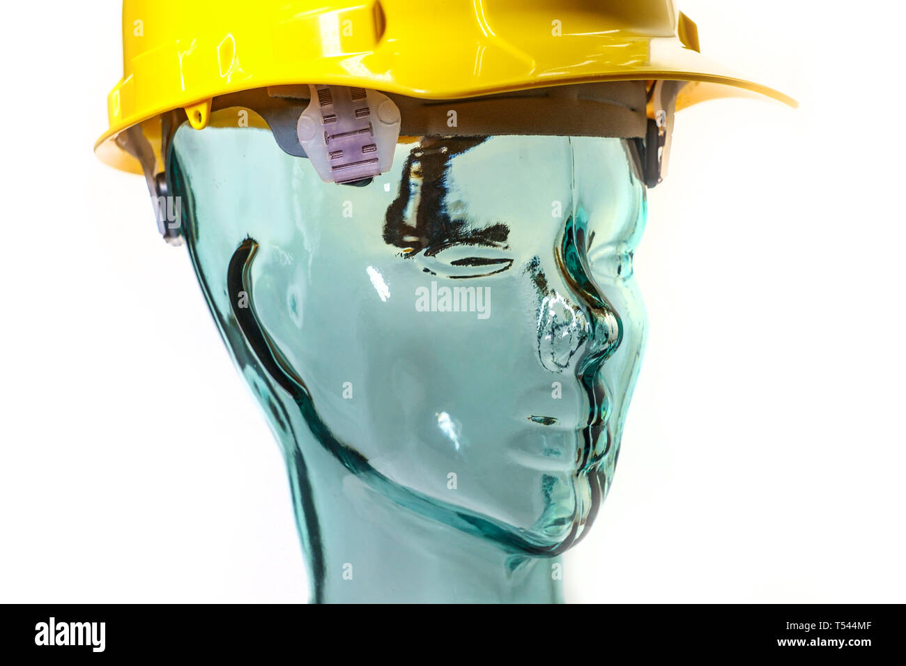 Robotic humanoid wears construction worker hard hat as job automation ...