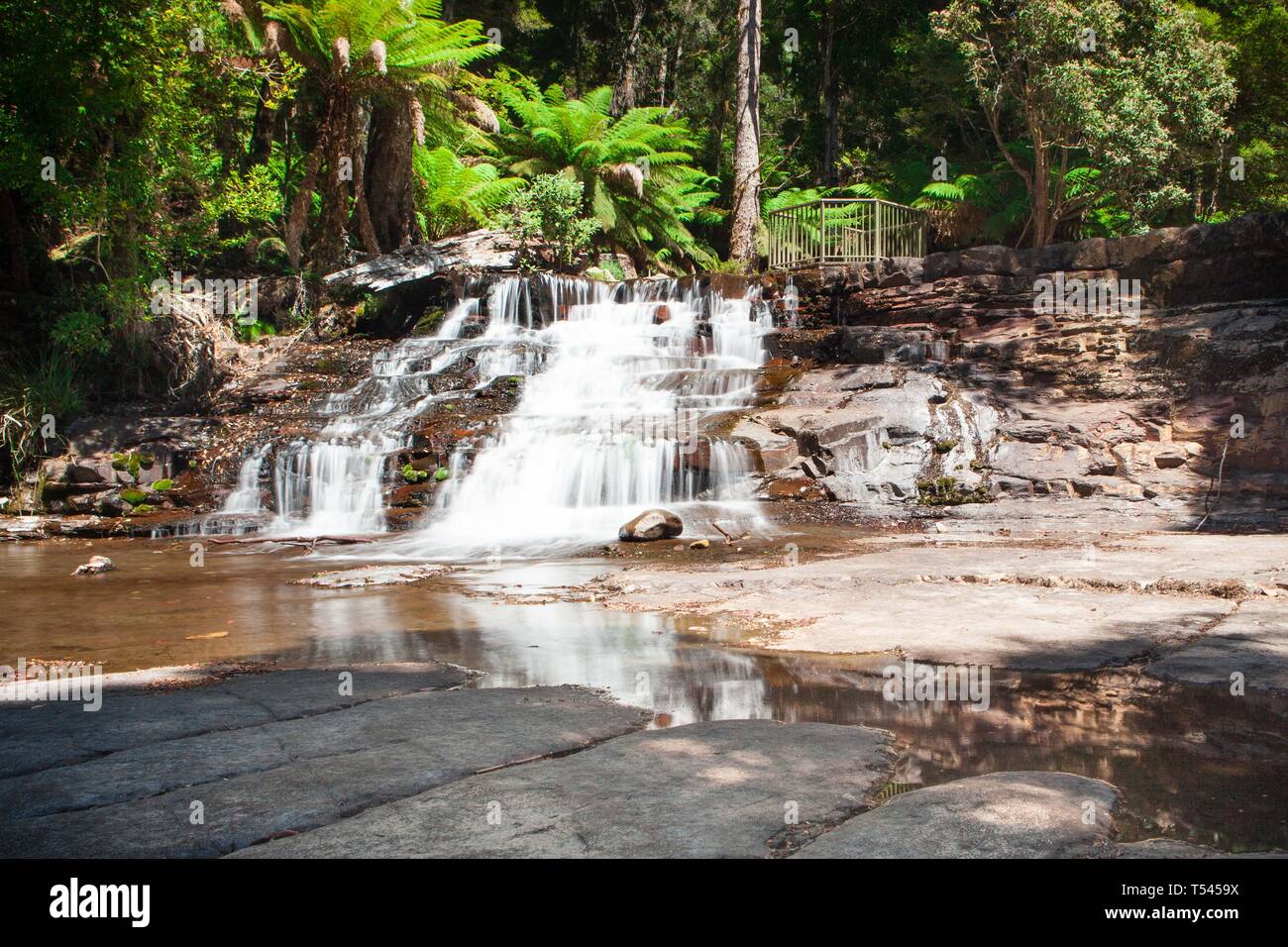 Liffey Falls cascades down several terraces onto large slabs of flat ...