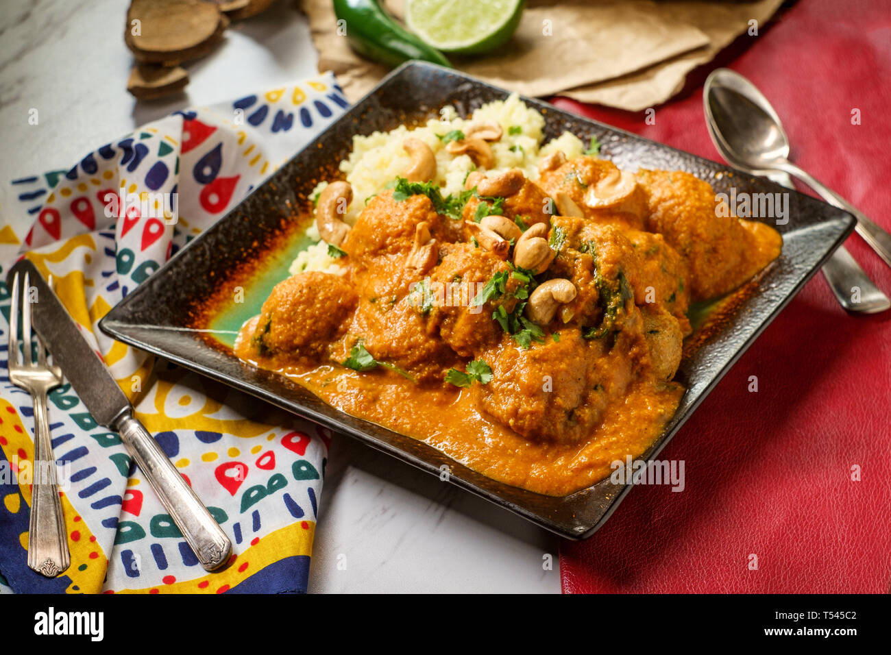 Vegetarian Malai Kofta balls in gravy sauce with tamarind basmati rice ...