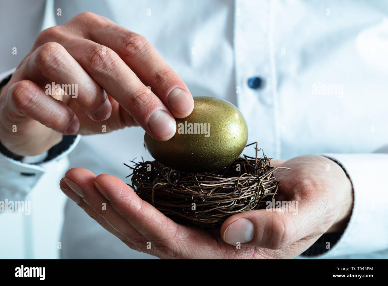 Man and egg hi-res stock photography and images - Alamy