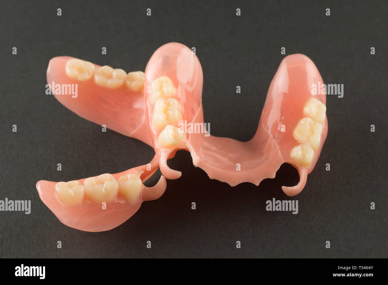 large image of a modern nylon denture on a black background Stock Photo ...