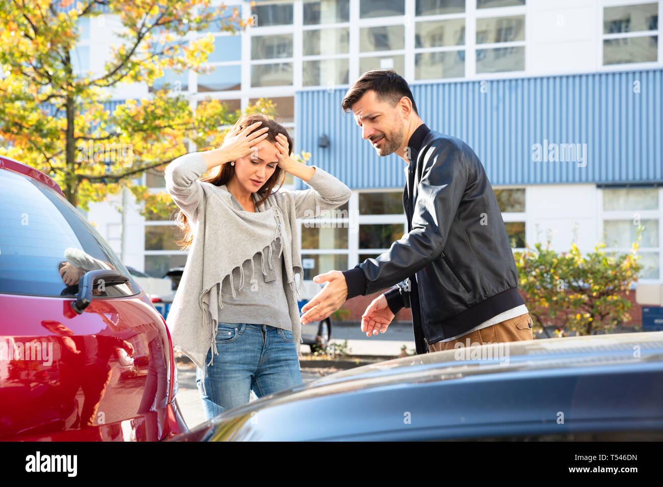 Young Man And Woman Arguing With Each Other After Car Accident On ...