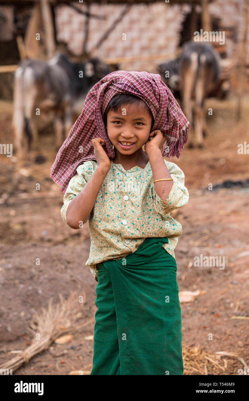 Young Shan girl in a village on the trek from Kalaw to Inle Lake, Shan ...