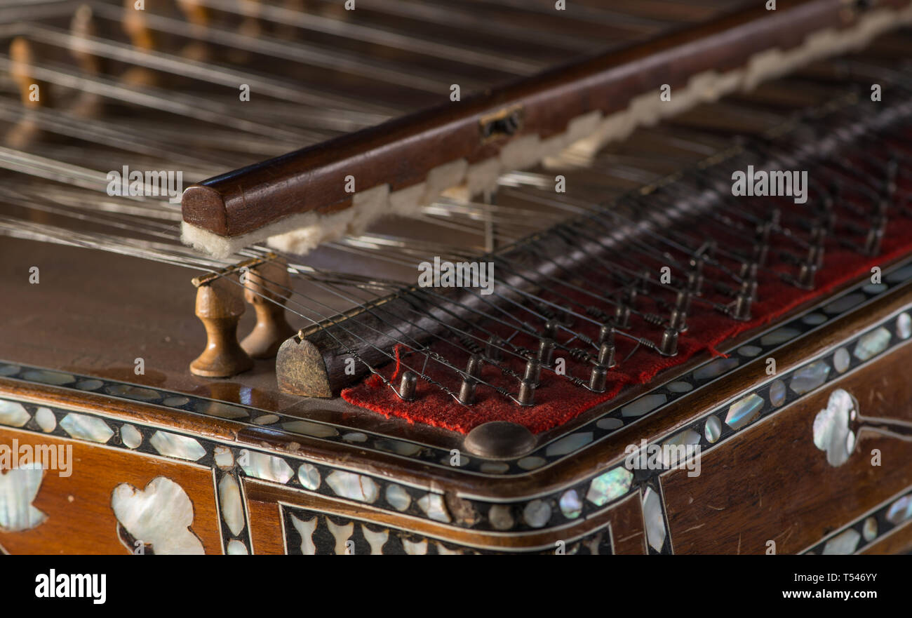 ancient Asian stringed musical instrument on black background with ...