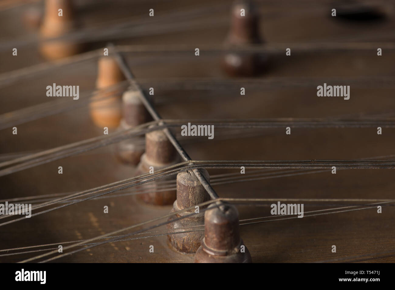ancient Asian stringed musical instrument on black background with ...