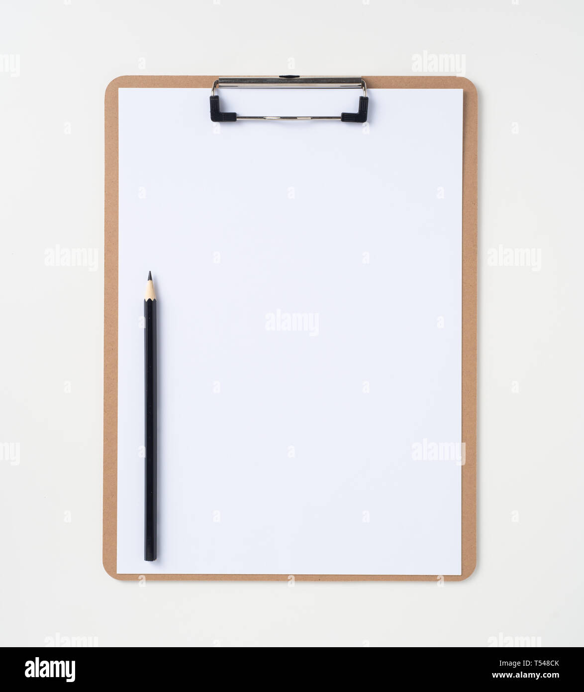 Design concept - top view of open and close white paper on brown ...