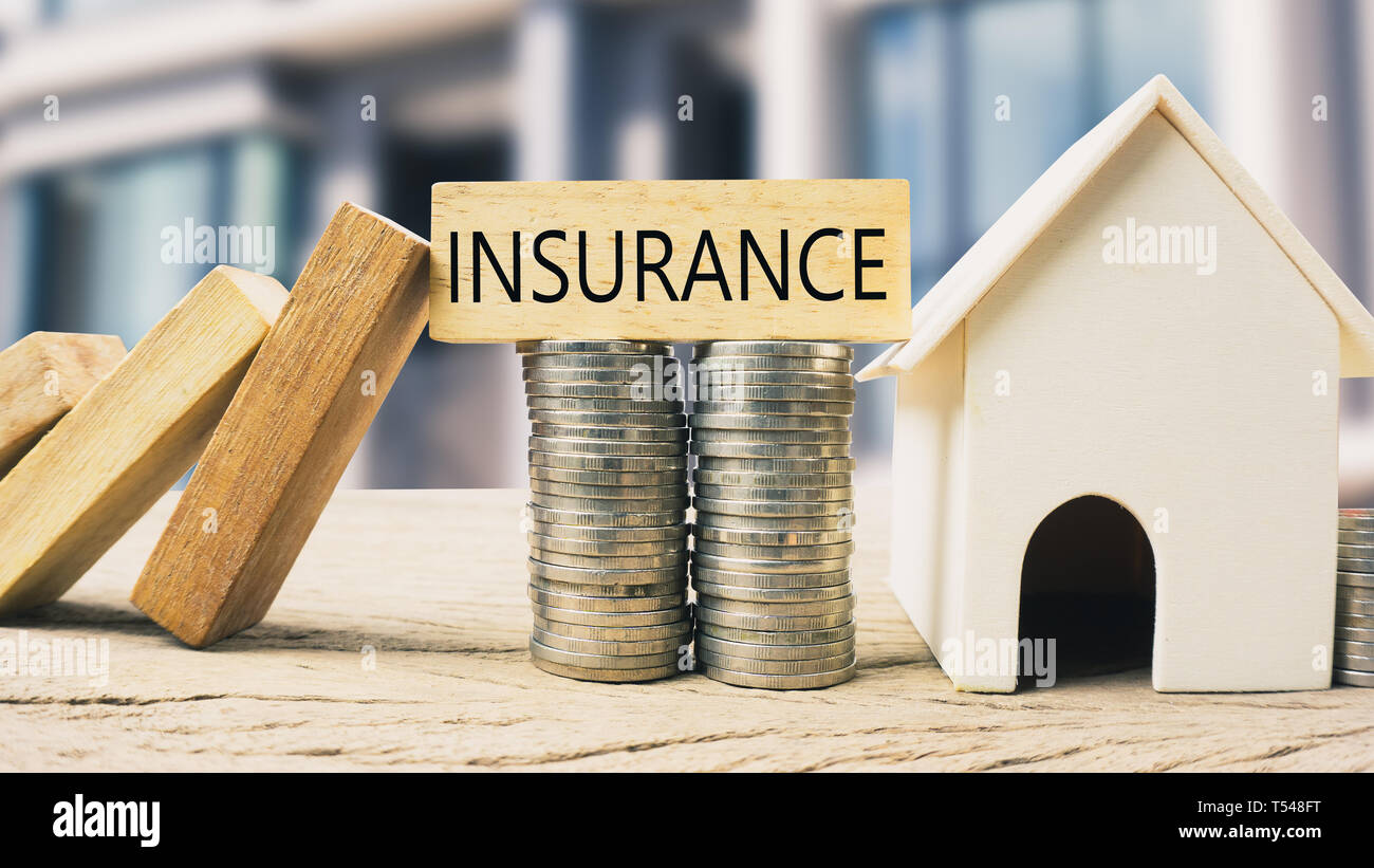 Home or real estate insurance protection concept. Horizontal wood block ...