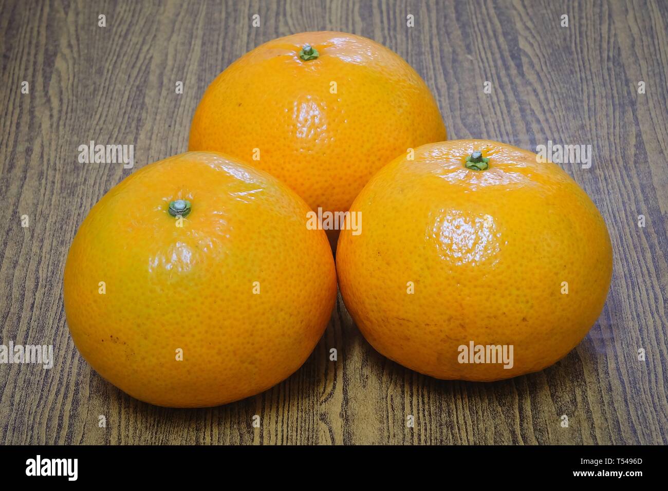 Three Fresh Ripe and Sweet Oranges on A Wooden Table, Orange Is The ...