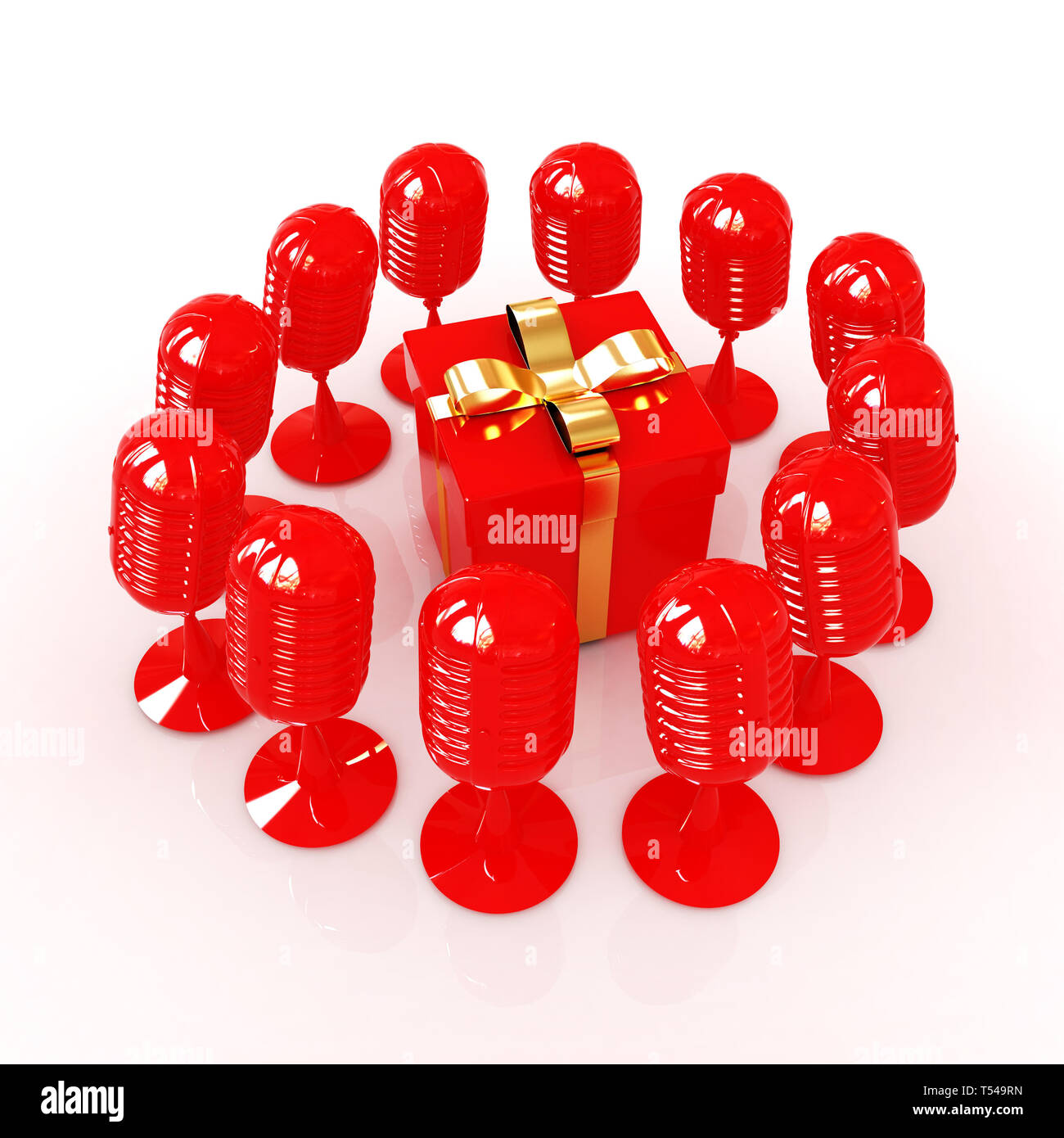 microphones around gift box Stock Photo - Alamy