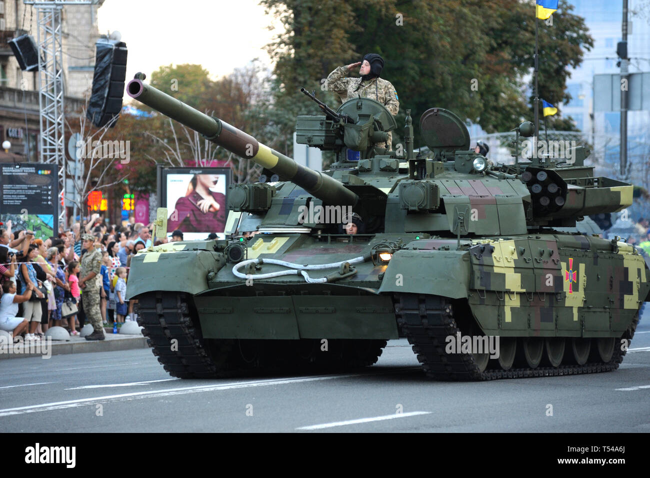 Ukrainian tanks driving on a square. Evening rehearsal of military ...
