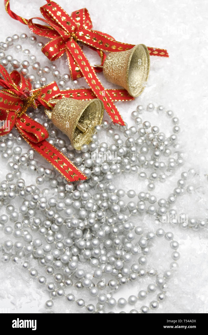 Beautiful Christmas Bells with Red Ribbons and Pearls Stock Photo - Alamy
