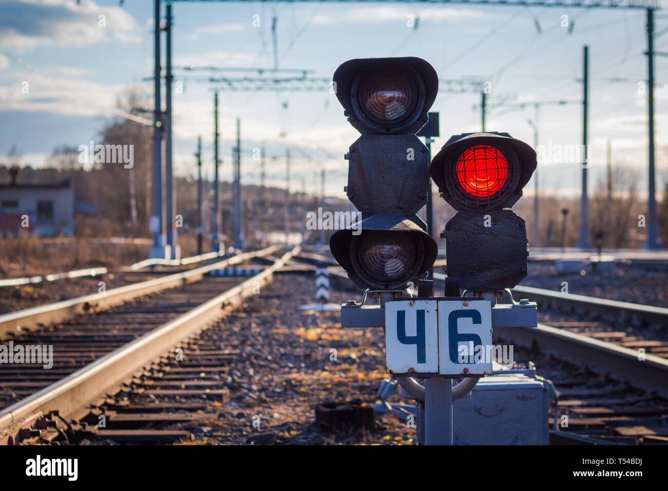 There is a traffic light on the railway for warning of train movement ...