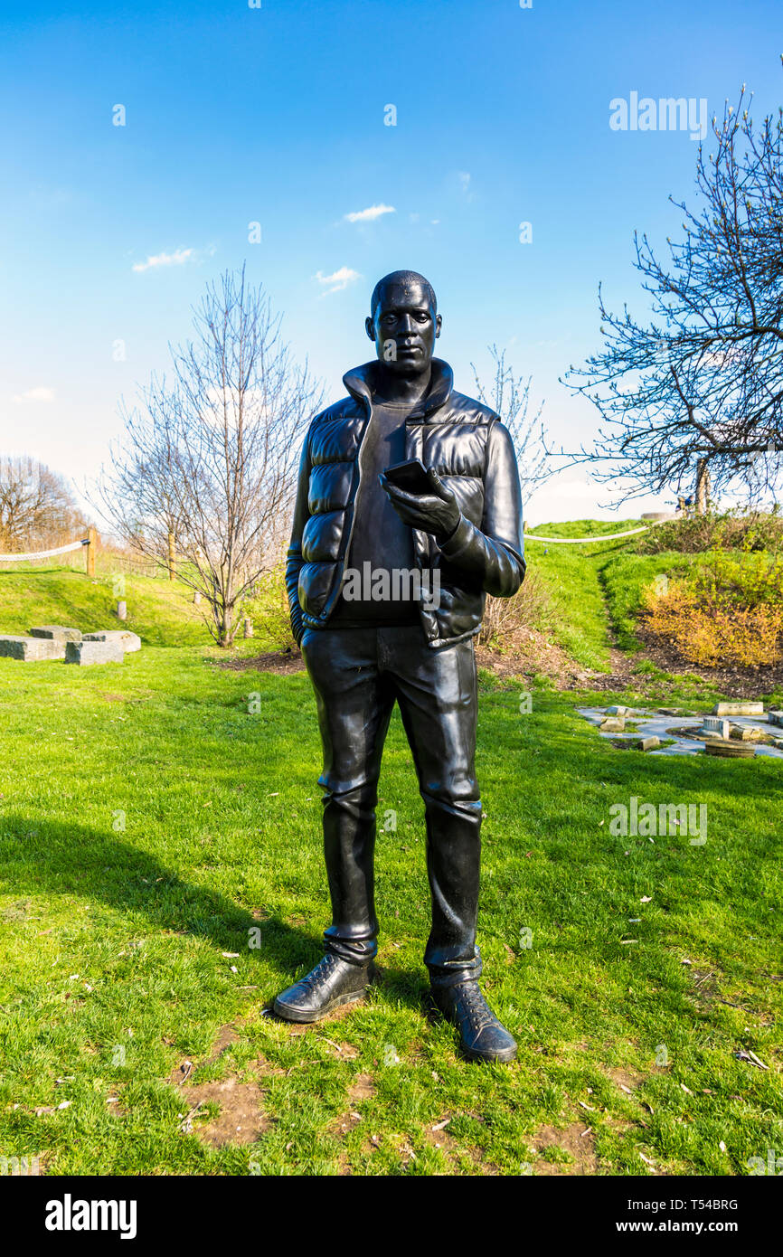 Sculpture of man holding a mobile phone by Thomas J Price, 'Network ...