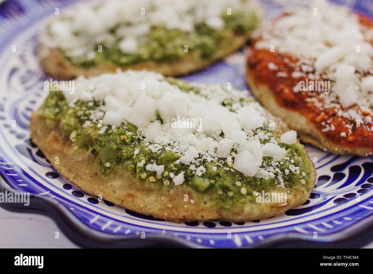 mexican tlacoyos with green and red sauce, Traditional food in Mexico ...