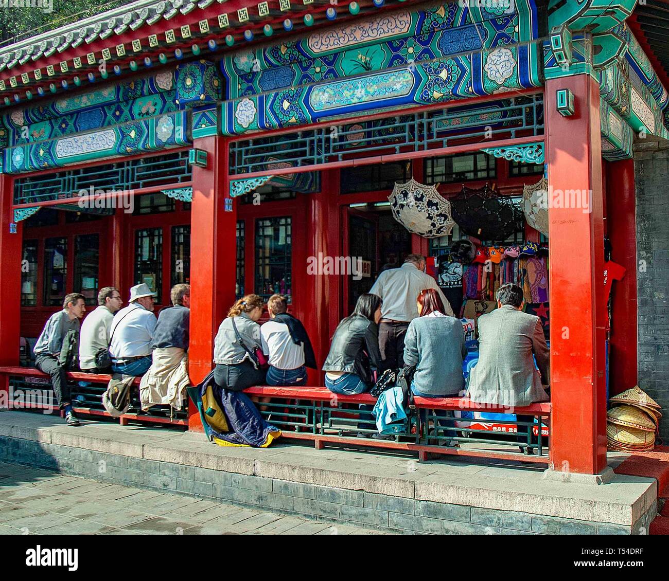 Badaling, Yanqing District, China. 19th Oct, 2006. Tourists sit in a ...