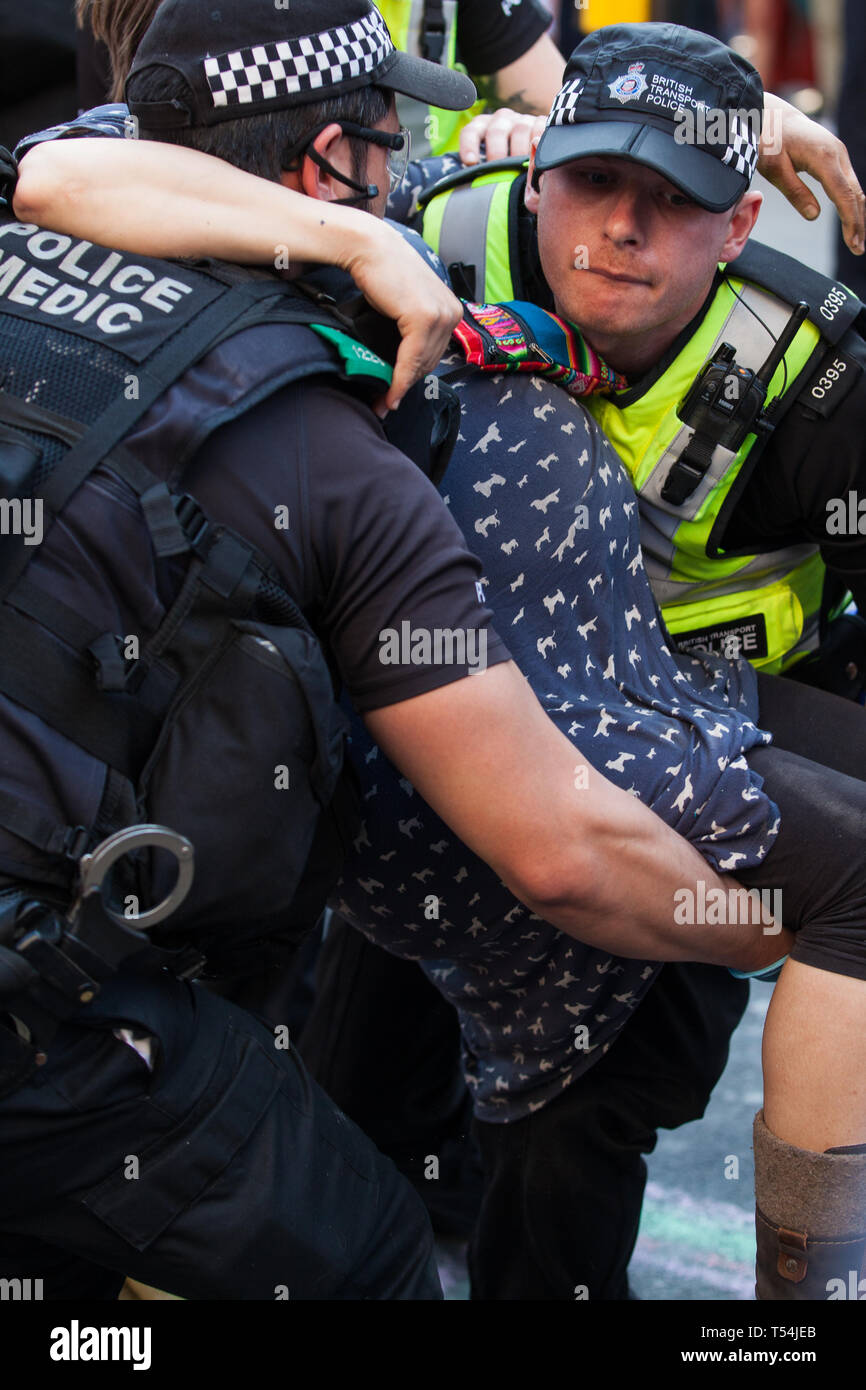 London, UK. 20th April 2019. Police officers remove Hanna, a seven ...