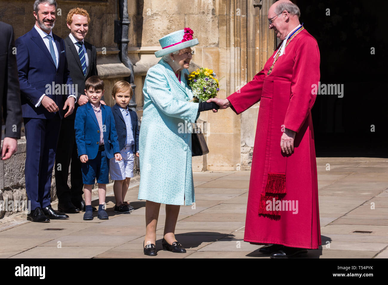 Windsor, UK. 21st April 2019. The Queen shakes hands with the Dean of ...