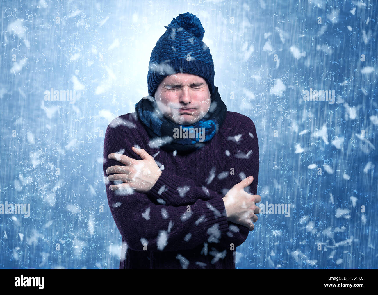 Handsome young boy shivering and trembling at snowstorm concept Stock ...