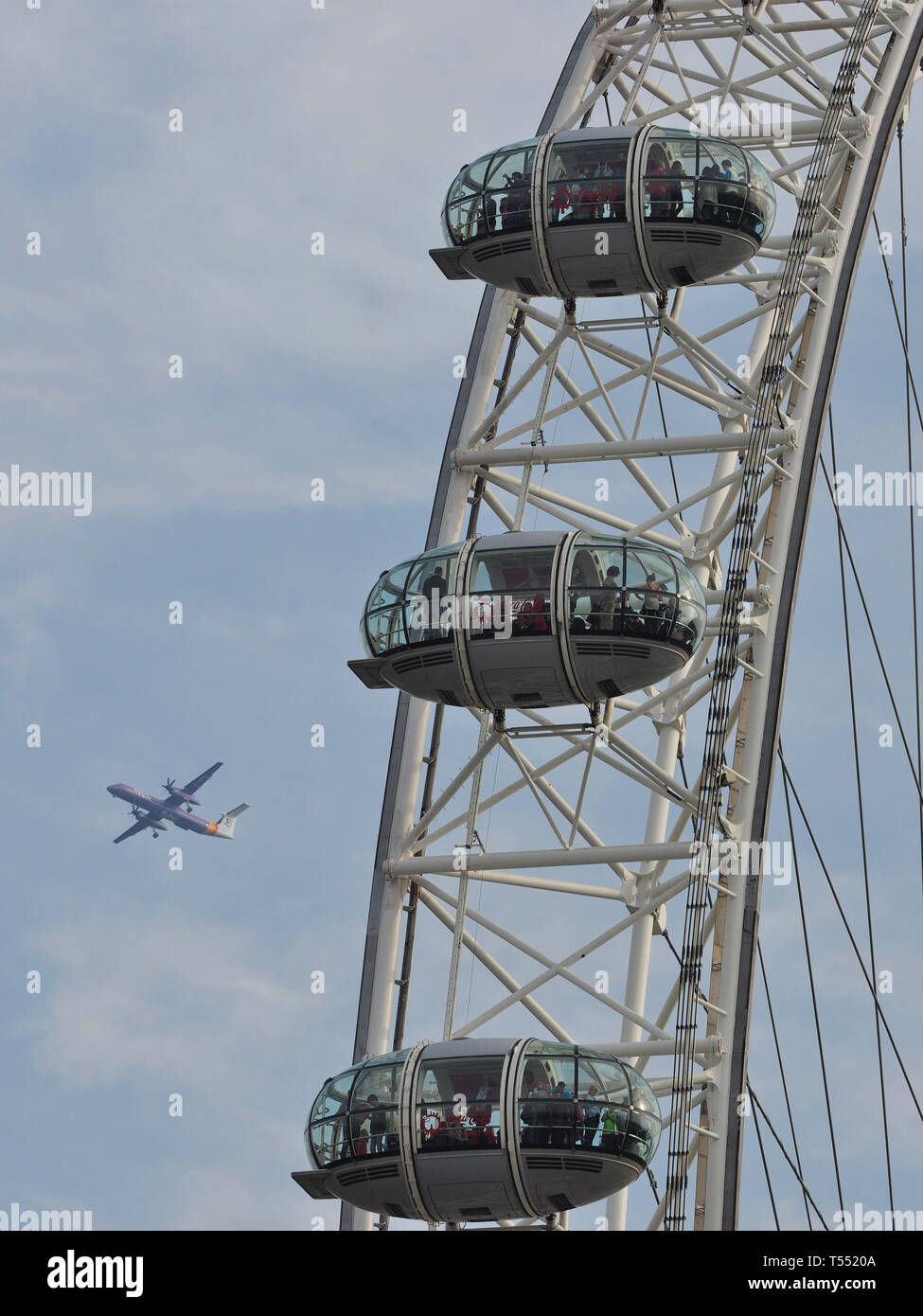 London Eye & flybe Prop Jet Aircraft flying by, London, England, UK ...