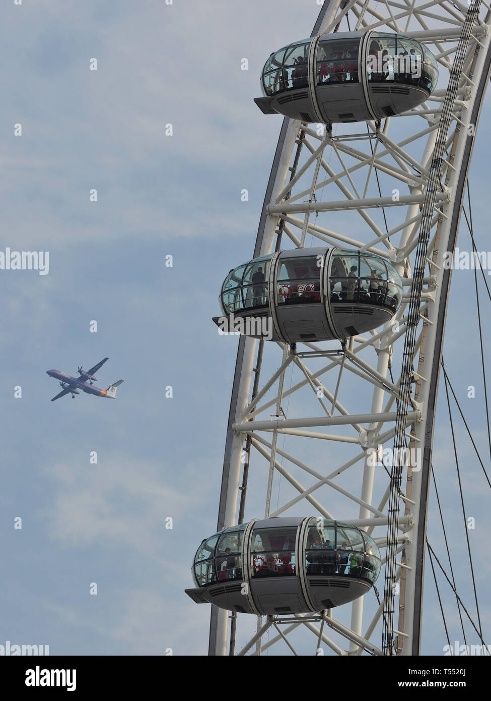 London Eye & flybe Prop Jet Aircraft flying by, London, England, UK ...