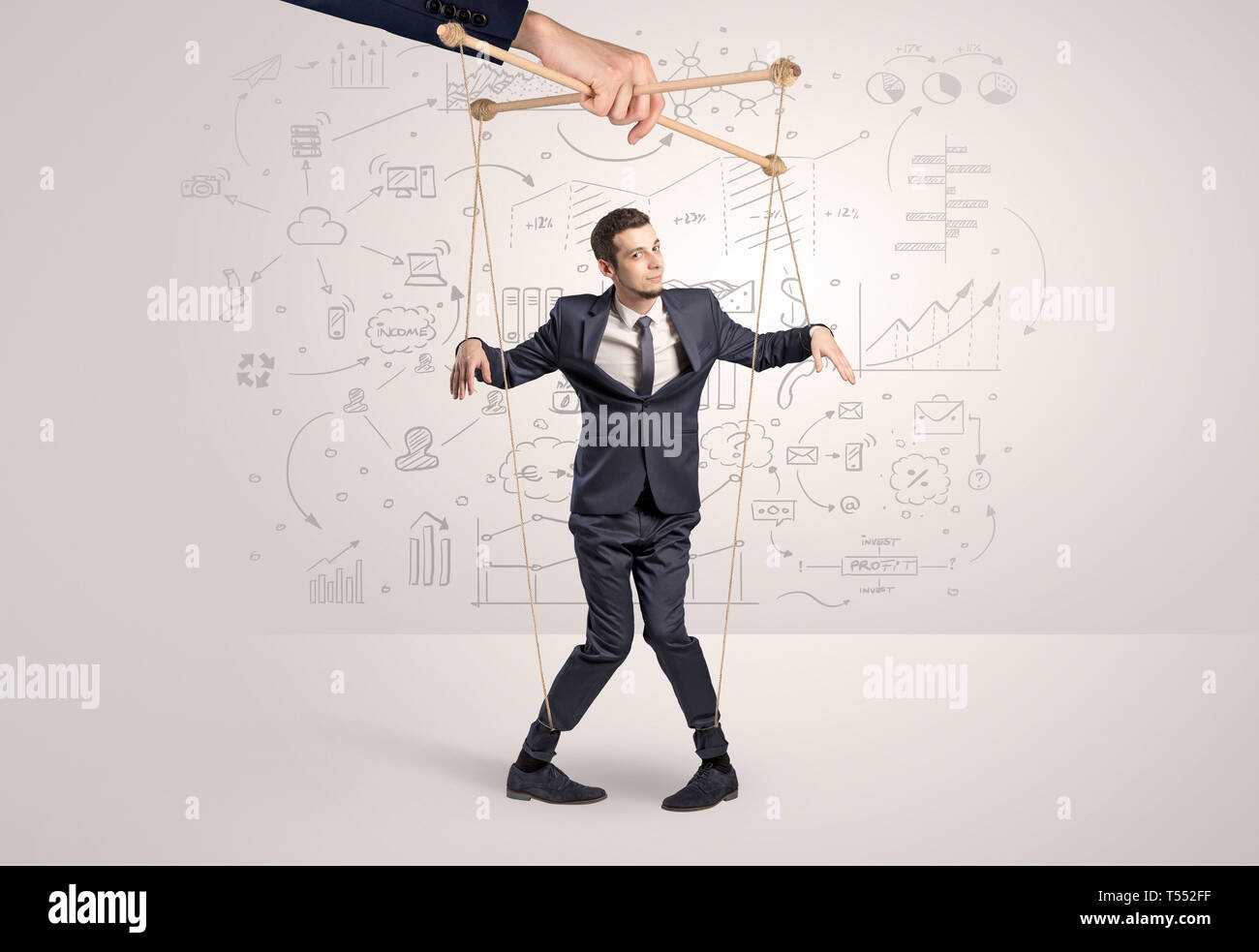 Little businessman controlled from above like a puppet concept Stock ...