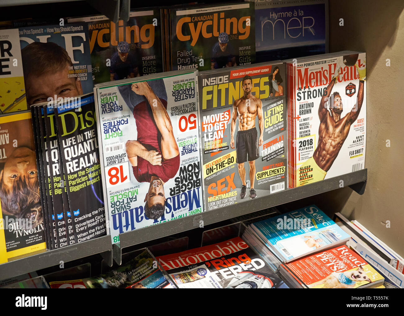 MONTREAL, CANADA - OCTOBER 9, 2018: A stack of sport and men's ...