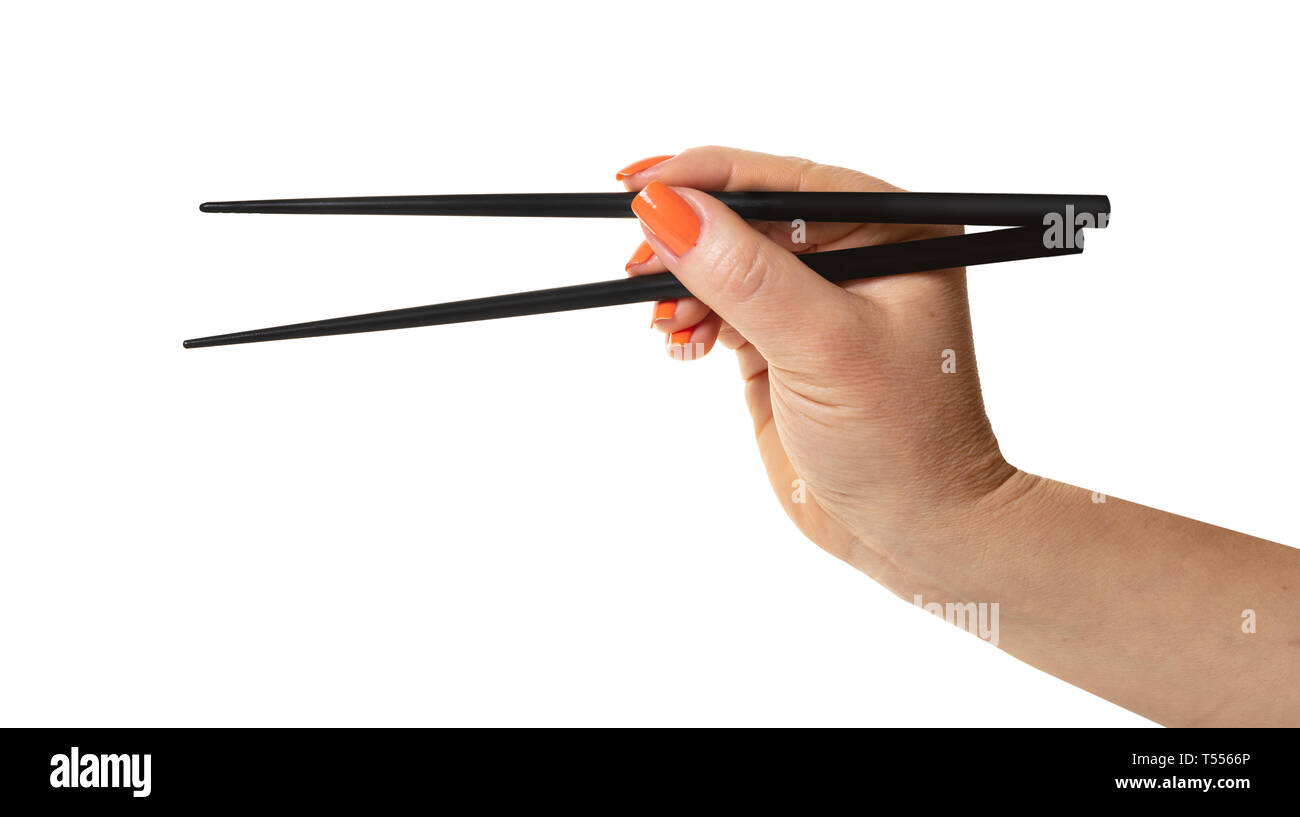 Hand using chopsticks hi-res stock photography and images - Alamy