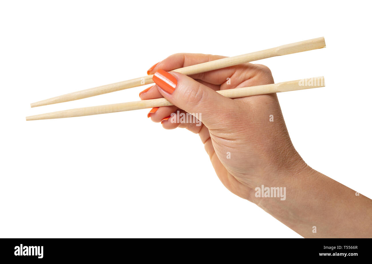 Hand using chopsticks hi-res stock photography and images - Alamy