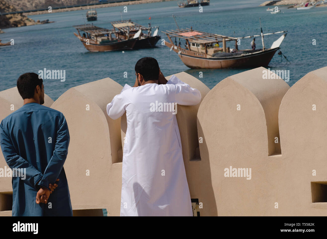 Traditional Omani Dhows anchored in the historic harbor of Sur on the ...