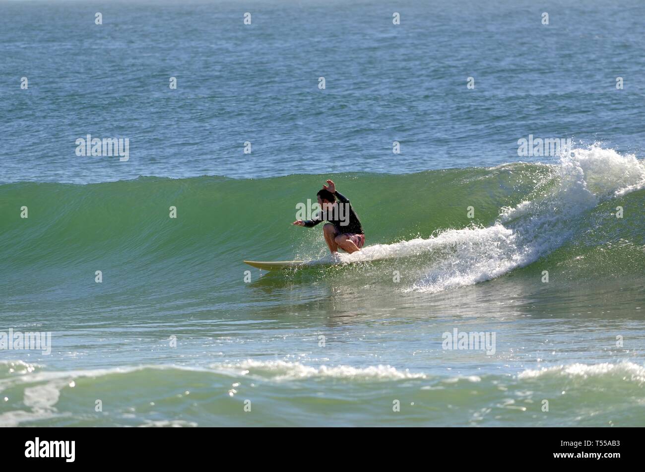 Surfing on Devil`s Beach, Uruguay Stock Photo - Alamy