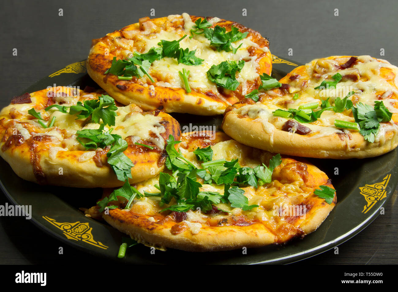 Mini pizzas with salami hi-res stock photography and images - Alamy