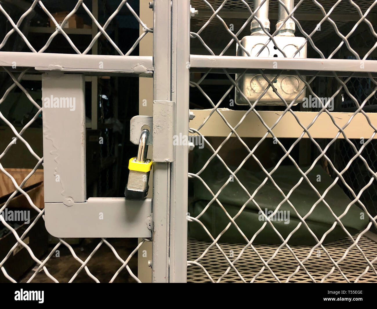 Secure Padlock on Army Supply Cage Stock Photo - Alamy