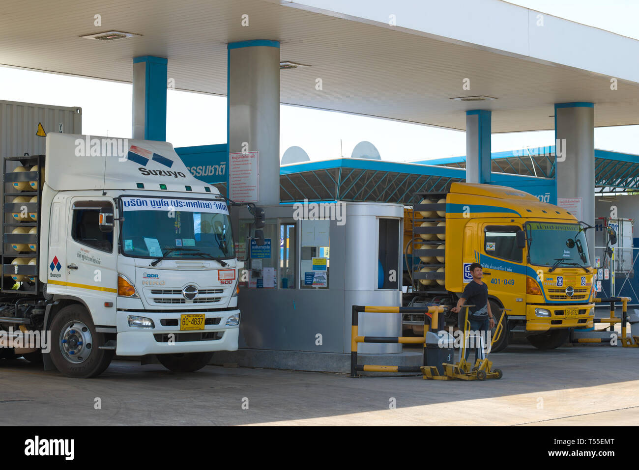BANGKOK, THAILAND - DECEMBER 14, 2018: Two Hino trucks on a gas station ...