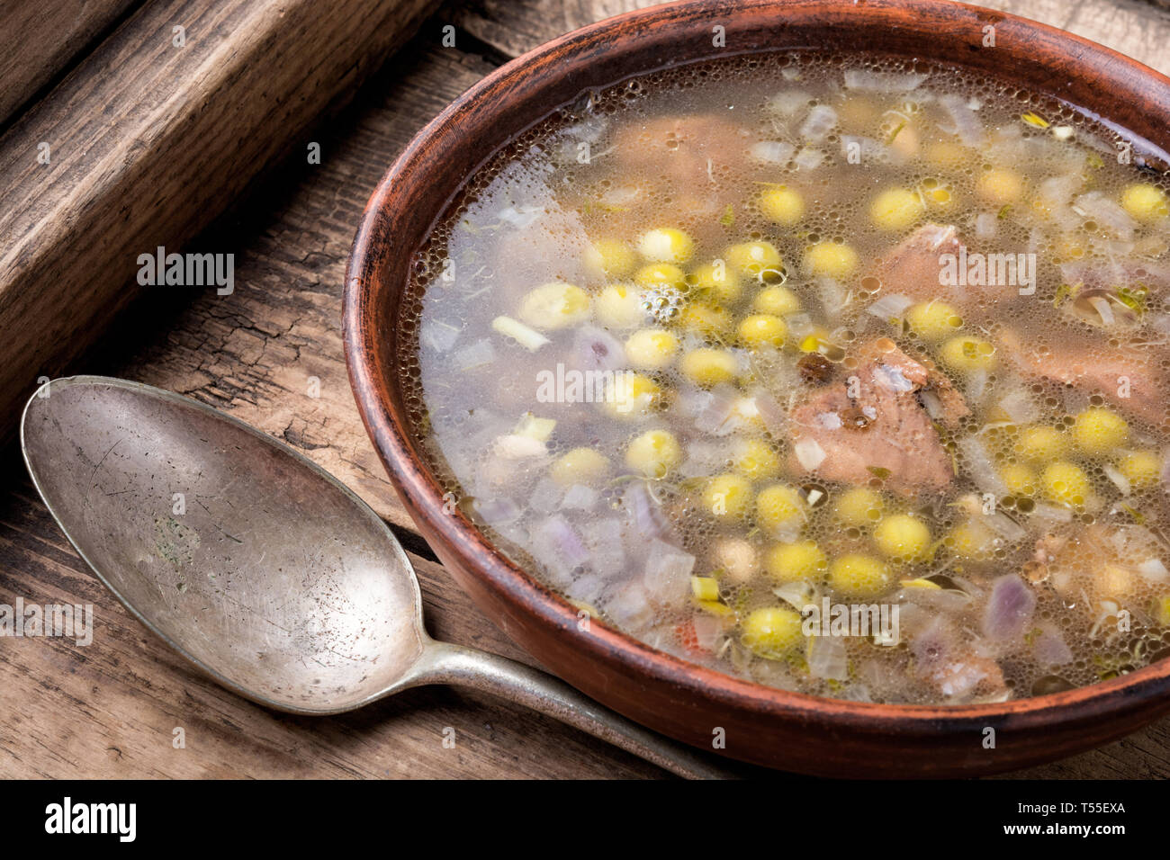 Peruvian chicken soup with cilantro and quinoa.Aguadito de Pollo Stock ...