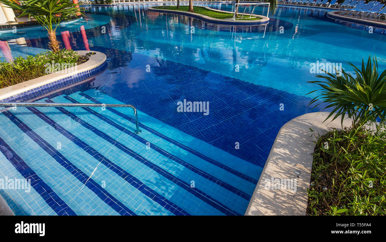 blue Swimming pool in Cancun, Riviera Maya, Mexico Stock Photo - Alamy