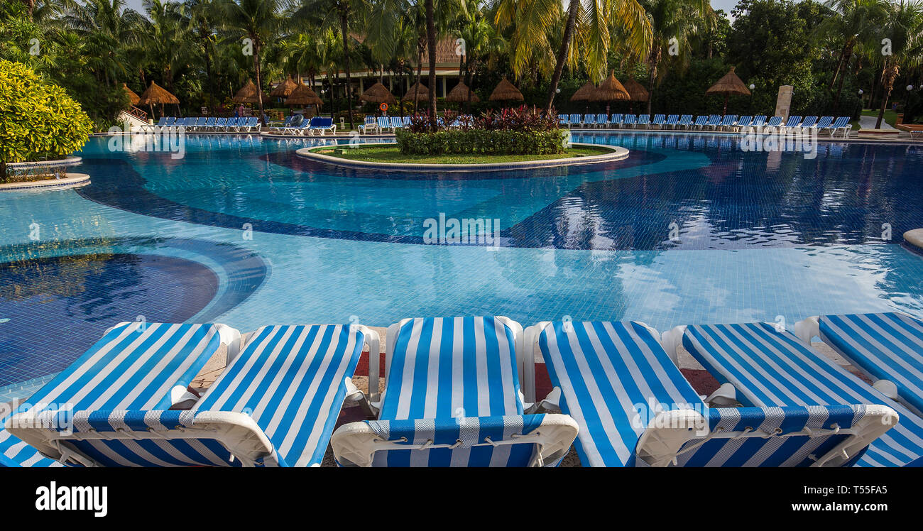 blue Swimming pool in Cancun, Riviera Maya, Mexico Stock Photo - Alamy