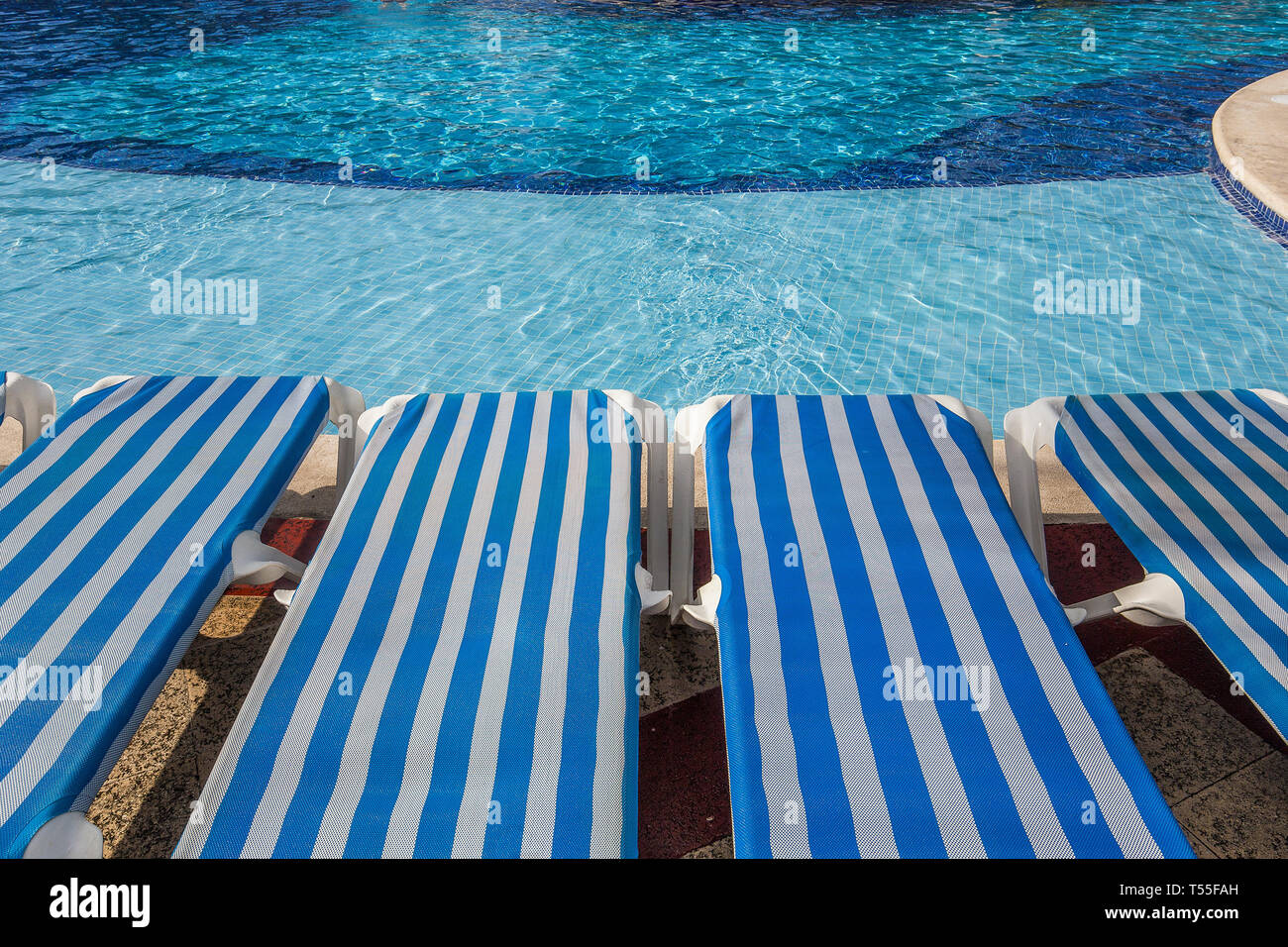 blue Swimming pool in Cancun, Riviera Maya, Mexico Stock Photo - Alamy