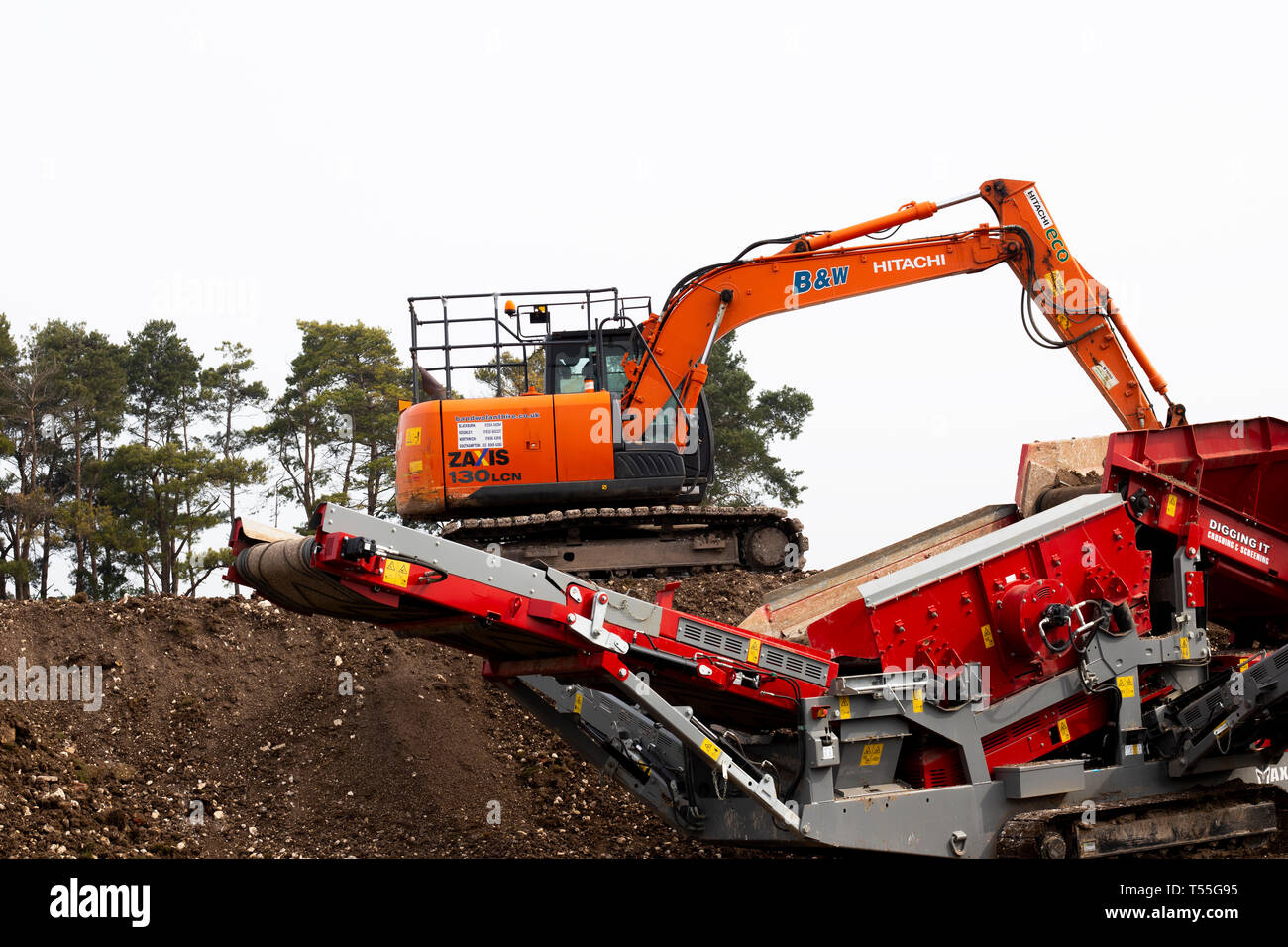 construction site excavators parked on earthworks on building site ...